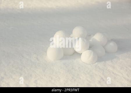 Pile of perfect round snowballs on snow outdoors Stock Photo - Alamy