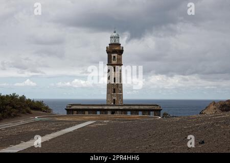 The lighthouse at Capelinhos, the westernmost part of Faial island ...