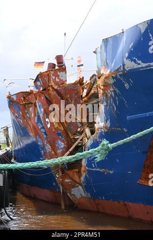 Emden, Germany. 26th Apr, 2023. The heavily damaged coaster lies in ...
