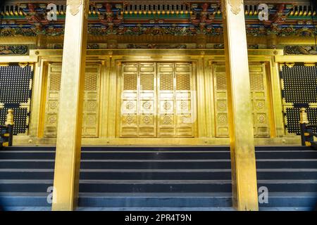 The ornate golden Karamon gate to the honden at the Ueno Tosho-gu ...