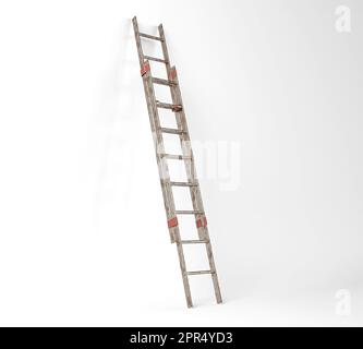 A regular metal aluminium extendable step ladder leaning against a ...