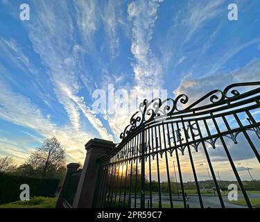 house behind the fence with the skies Stock Photo - Alamy