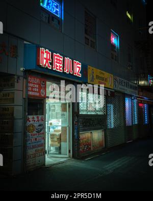 Signs at night in Flushing, Queens, New York Stock Photo - Alamy