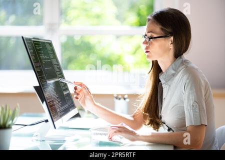Woman Programmer. Girl Coding Software On Computer Stock Photo - Alamy