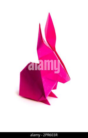 Pink paper rabbit origami isolated on a white background Stock Photo ...