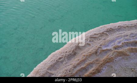 Large Salt accumulated on the shore of the Dead sea. Deposits of ...