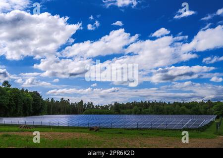 Photovoltaic energy creation with solar panels on the roof Stock Photo ...
