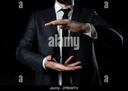 Businessman Holding Important Message Between Hands. Man In Suit ...