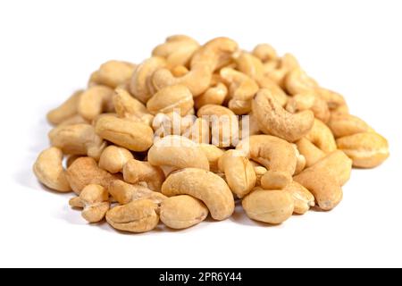 Cashew kernels against white background Stock Photo - Alamy