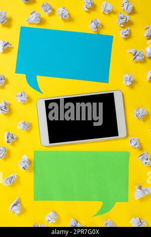 Paper Wraps Placed Around Tablet And Two Speech Bubbles With Important ...