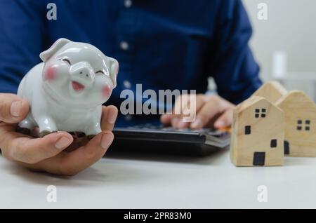 Saving money for real estate investments and buildings or home ...