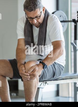 Sports, gym and injury, old man with arm pain, emergency during workout ...