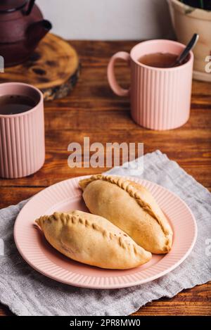 Oven Baked Cabbage Pies on Plate Stock Photo - Alamy