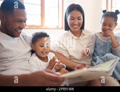 Hispanic Family Reading Together