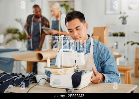 tailor man making clothes in textile workshop in Vietnam Stock Photo ...