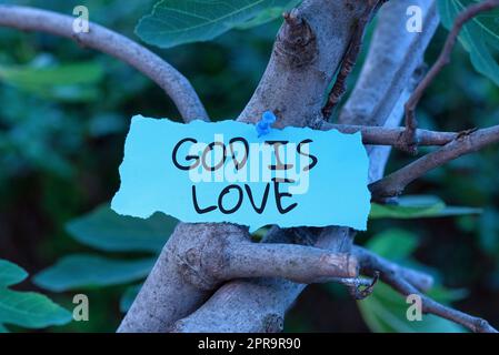 Conceptual caption God Is Love. Business showcase Believing in Jesus ...