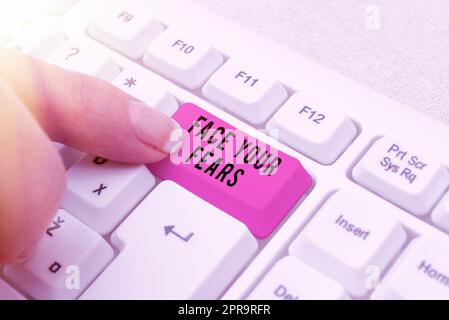 Sign displaying Face Your Fears. Word for Have the courage to overcome ...