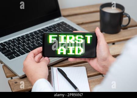 Text sign showing First Aid. Business concept Practise of healing small ...