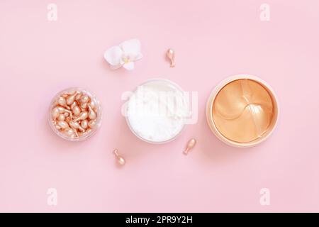 Top view of face and eye cream squeeze cosmetic tube with long nozzle ...