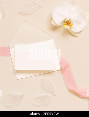 Blank card and envelope over pink background Stock Photo - Alamy