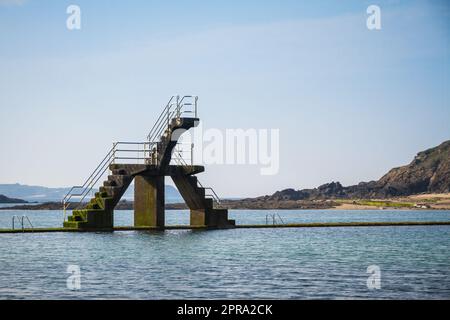 Saint-Malo natural swimming pool and diving at sunset, brittany, France ...