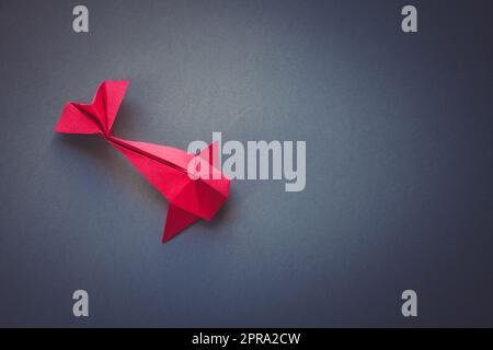 Red paper fish origami isolated on a blank grey background Stock Photo ...