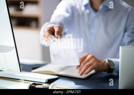 Businessperson Hands Giving Cheque To Other Person Stock Photo - Alamy