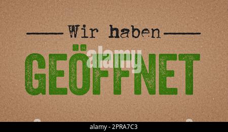 We are open in german written on a retro paper background - Wir haben ...