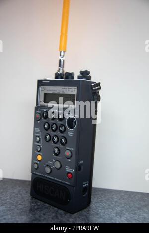Two-way radio with yellow antenna for communication Stock Photo - Alamy