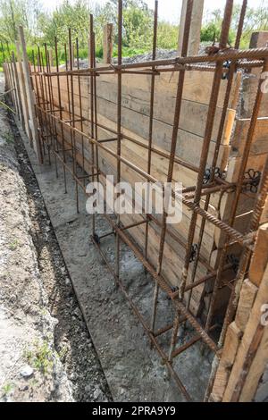 Tied rebar and mounted formwork close-up before pouring the strip ...