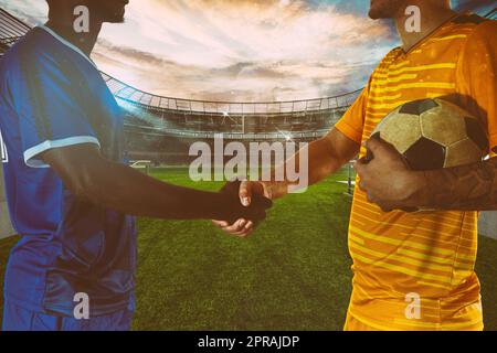 Two opposing players give an handshake at the end of the game Stock ...