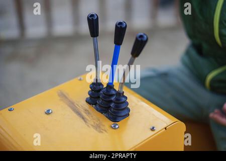 Controlling lever switch of crane truck vehicle Stock Photo - Alamy