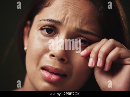 No shoulder to cry on. Cropped portrait of an attractive young woman ...