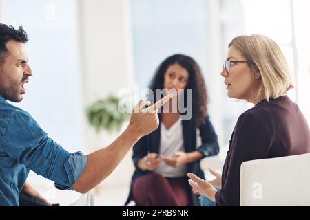 husband and wife arguing during couples therapy Stock Photo - Alamy
