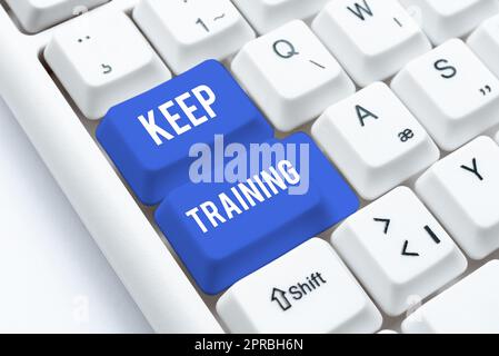 Sign displaying Keep Training. Business overview Grounding Drilling ...