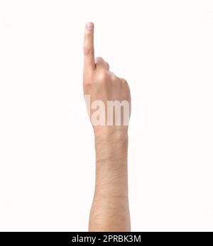 Man hand showing forefinger up and number one sign in a white isolated ...