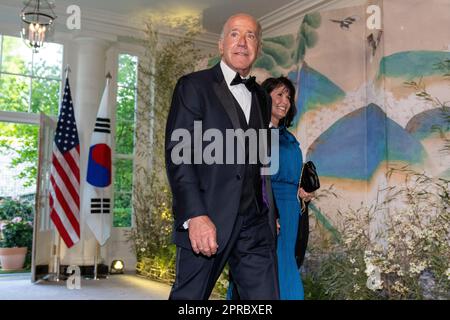 Frank Biden, left, and Mindy Ward arrive for the State Dinner with ...