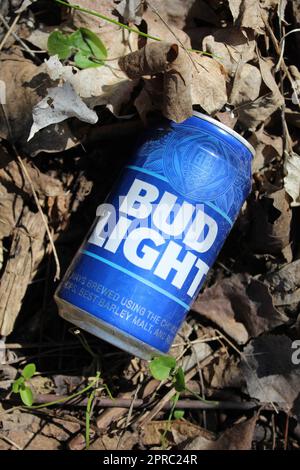 Litter - an empty Bud Light beer can left in the sand and gravel on the ...