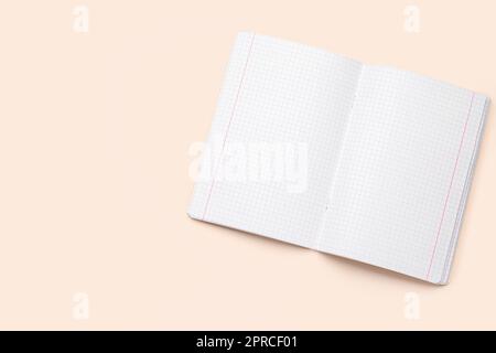 Blank copybook pages on beige background Stock Photo - Alamy