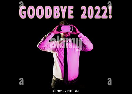 Goodbye 2022 word. Written on wooden frame. Studio shoot Stock Photo ...