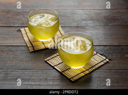 Cold Japanese green tea placed in a place with a view of the garden ...