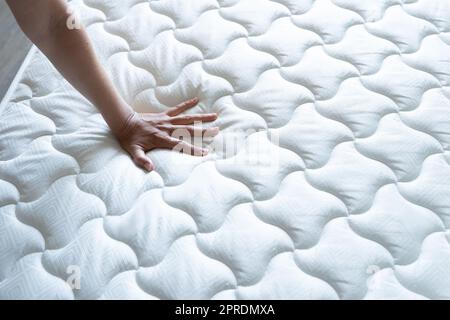 Hand Testing Orthopedic Memory Foam Core Stock Photo - Alamy