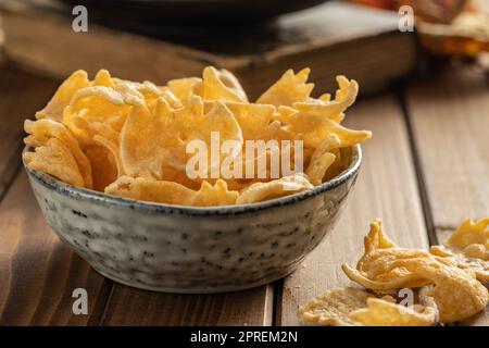 Halloween crispy bat shaped chips in the bowl Stock Photo - Alamy