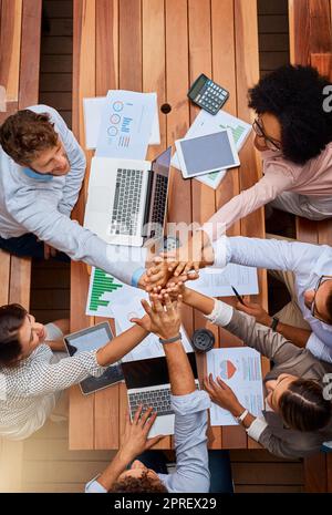 Business people high fiving during business meeting Stock Photo - Alamy