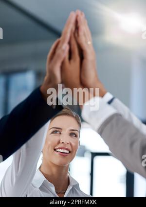 Happy motivated female employee celebrating finished tasks. Successful ...