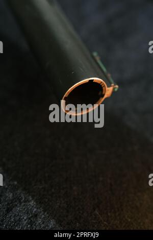 Muzzle of shotguns. Shotgun - macro shooting. Muzzle end of the barrel ...
