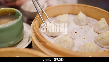 Chinese style steamed soup bun in restaurant Stock Photo - Alamy