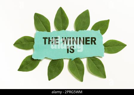Conceptual caption The Winner Is.... Business showcase Announcing who ...
