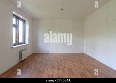Interior of a small empty room with one window during renovation Stock ...