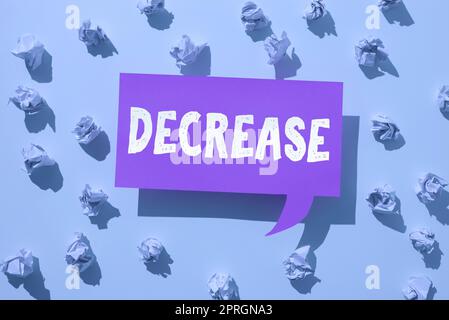 Sign displaying Decrease. Business approach make or become smaller or fewer in size amount ...